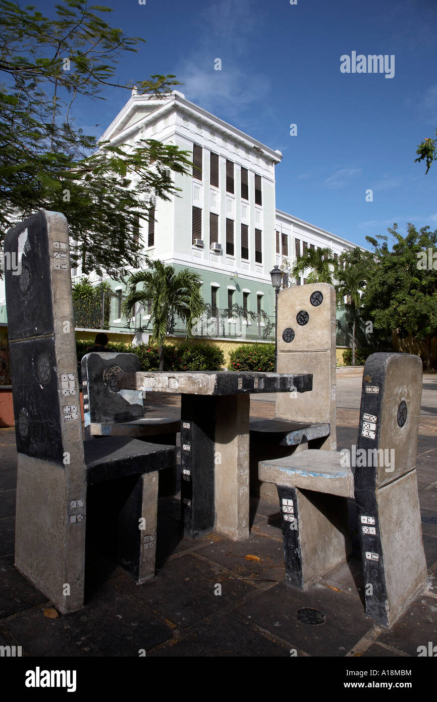 area with chairs and tables for playing dominos along calle de san ...