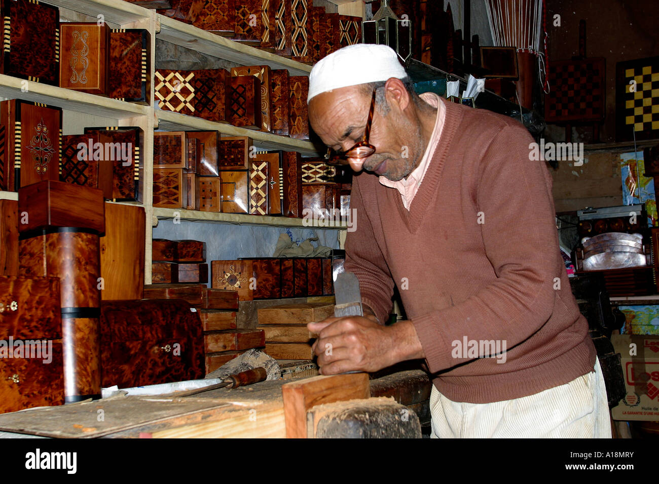 Morocco Essaouira craftsman planing thuya wood Stock Photo - Alamy