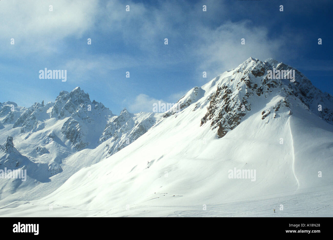 Courchevel Ski resort in winter on piste with mountain alpine peaks in ...