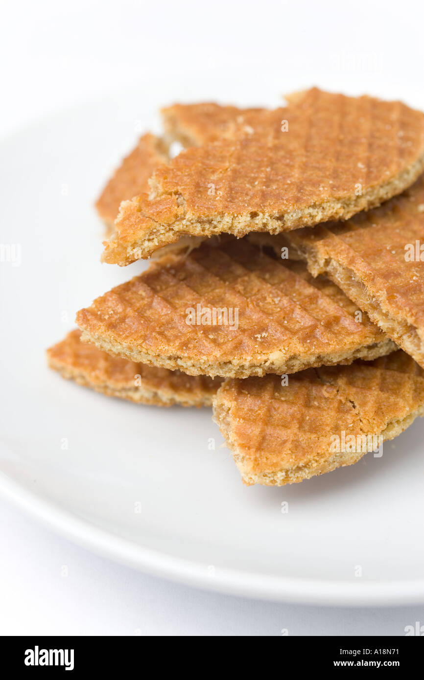 Pile of Broken Waffles on Porcelain Plate Stock Photo - Alamy