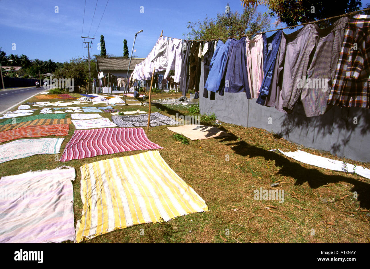 India South Andaman Island Port Blair laundry laid at roadside to dry ...