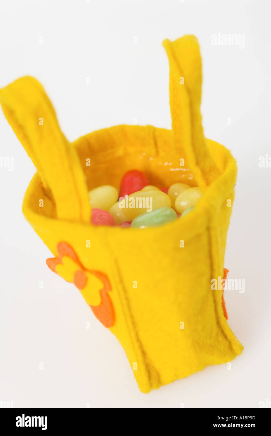 Easter Candies in Yellow Bag Stock Photo - Alamy