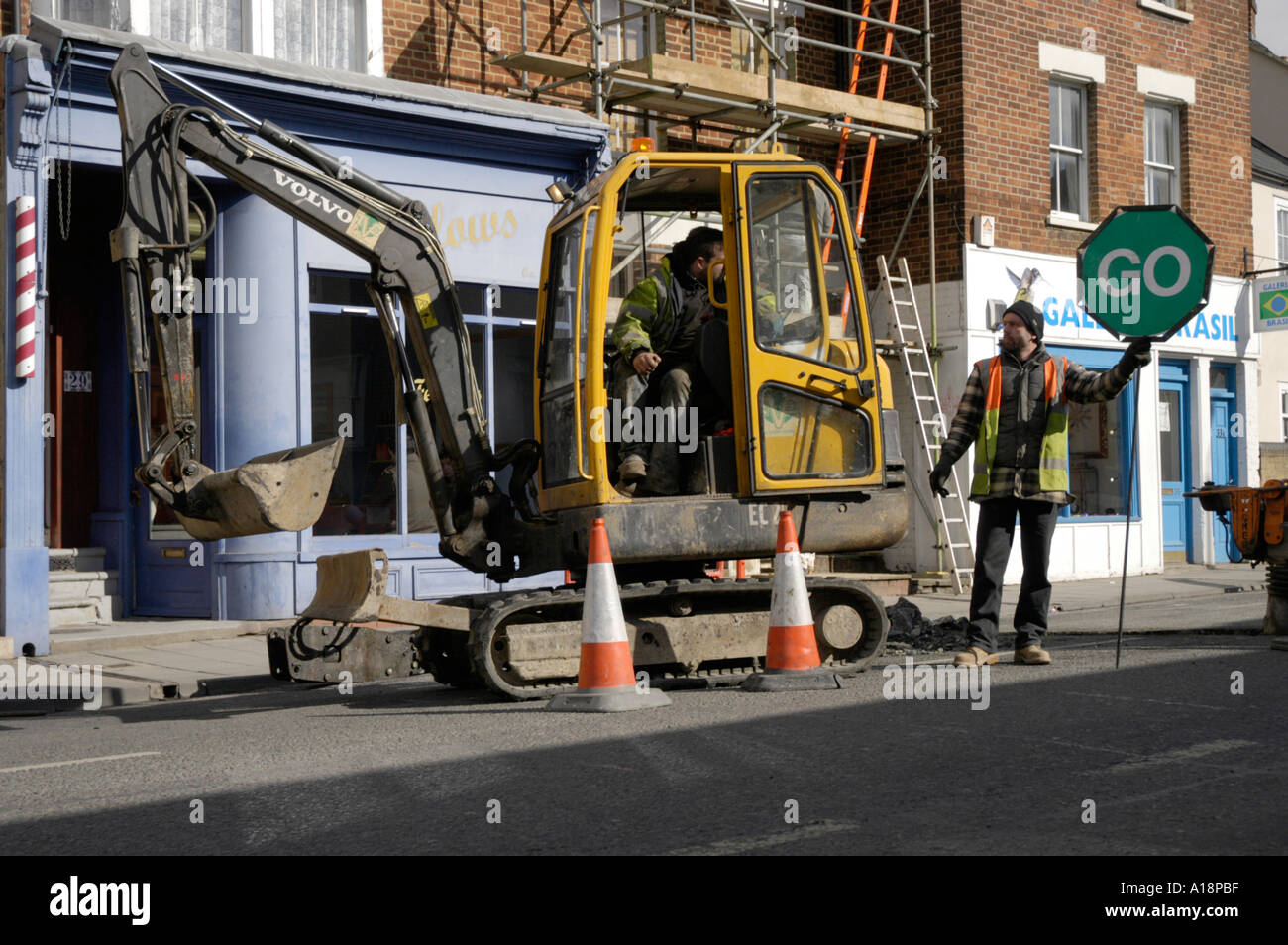 Stop go sign workers road hi-res stock photography and images - Alamy