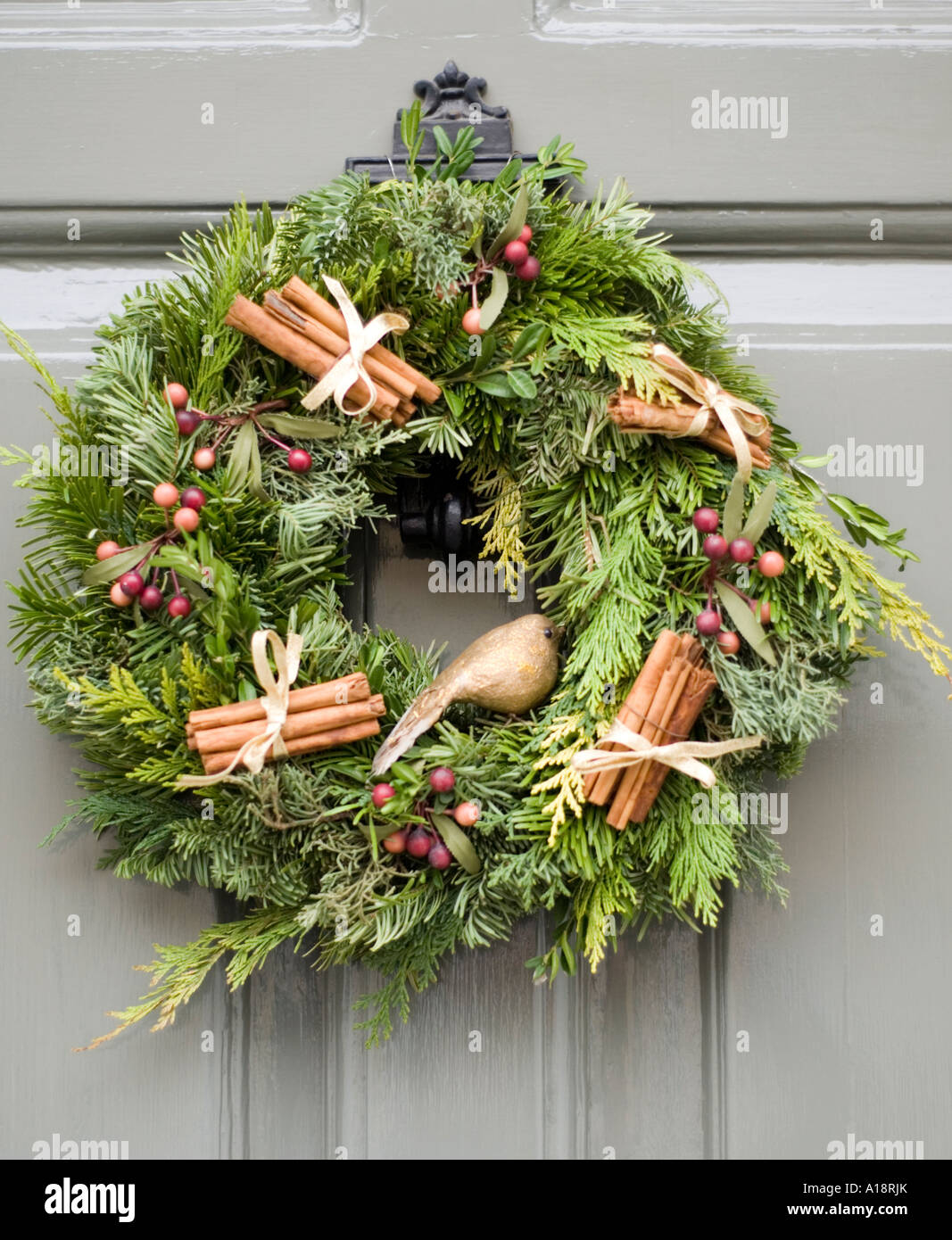 England UK Christmas wreath on a front door Stock Photo - Alamy