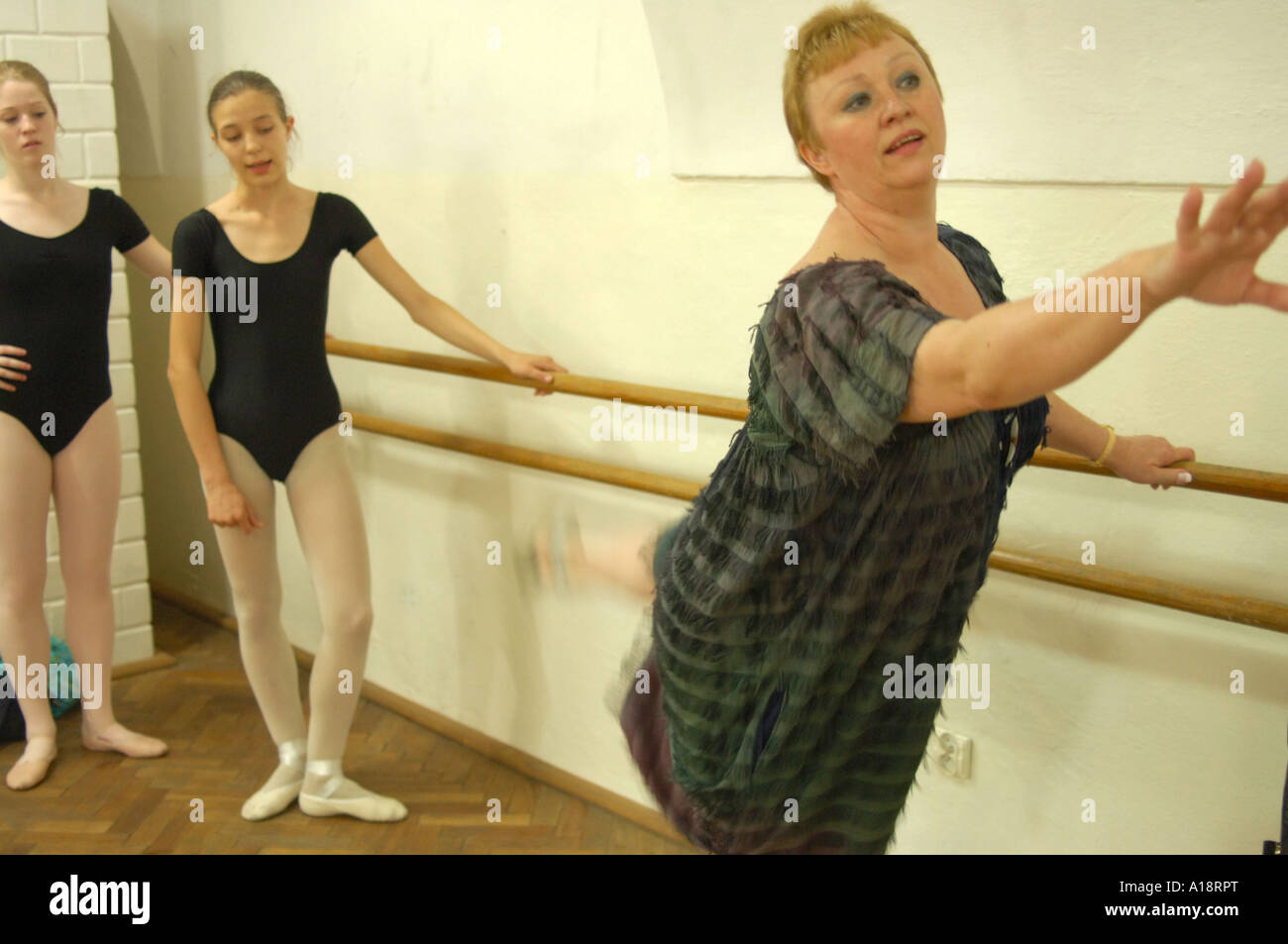 Ballet professor teaching and dancers from Ukraine training at ...