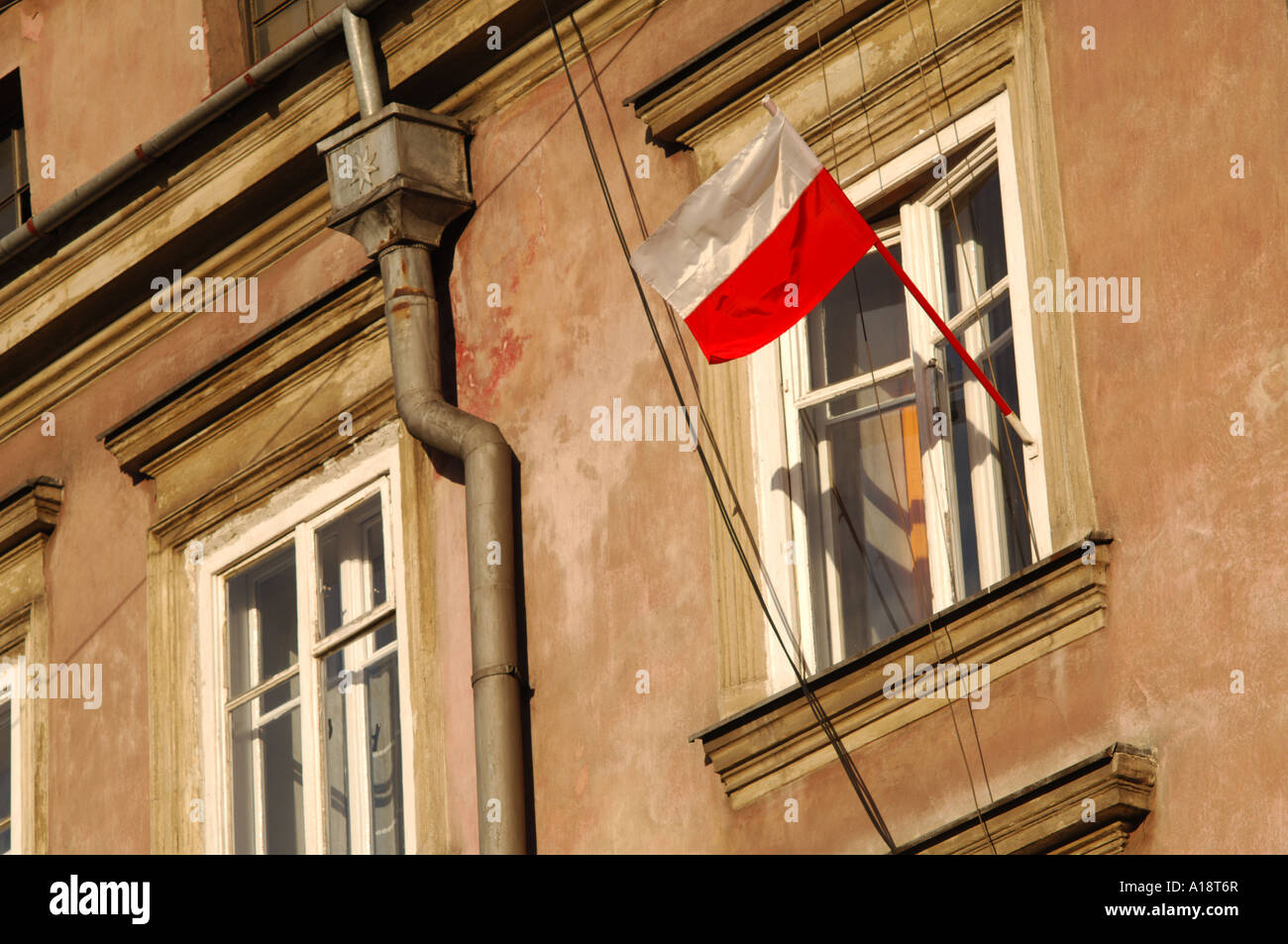 A Polish national flag hanging outside an appartment window in central ...