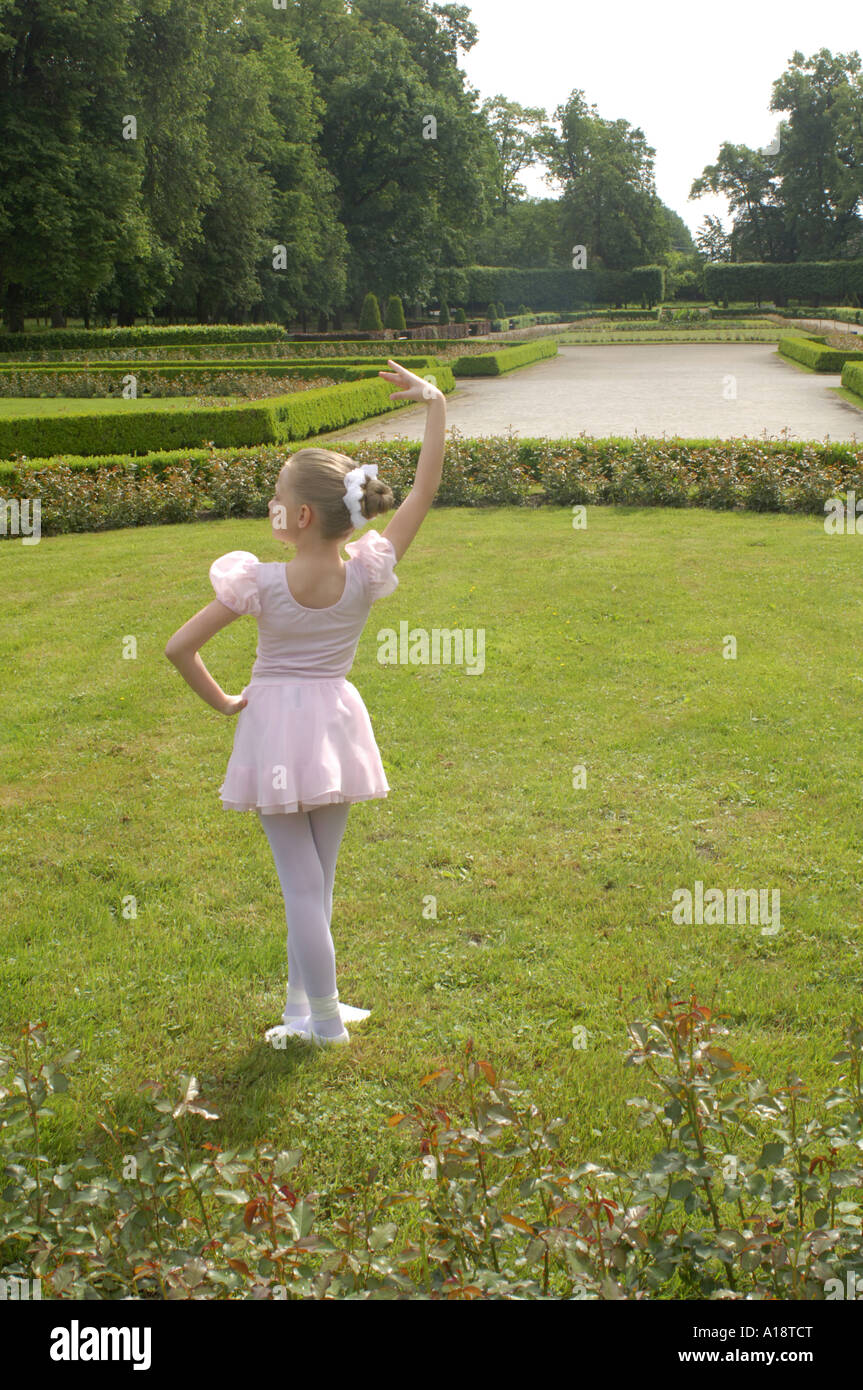 A young Polish ballet dancer standing outside Kozluwka country house in ...