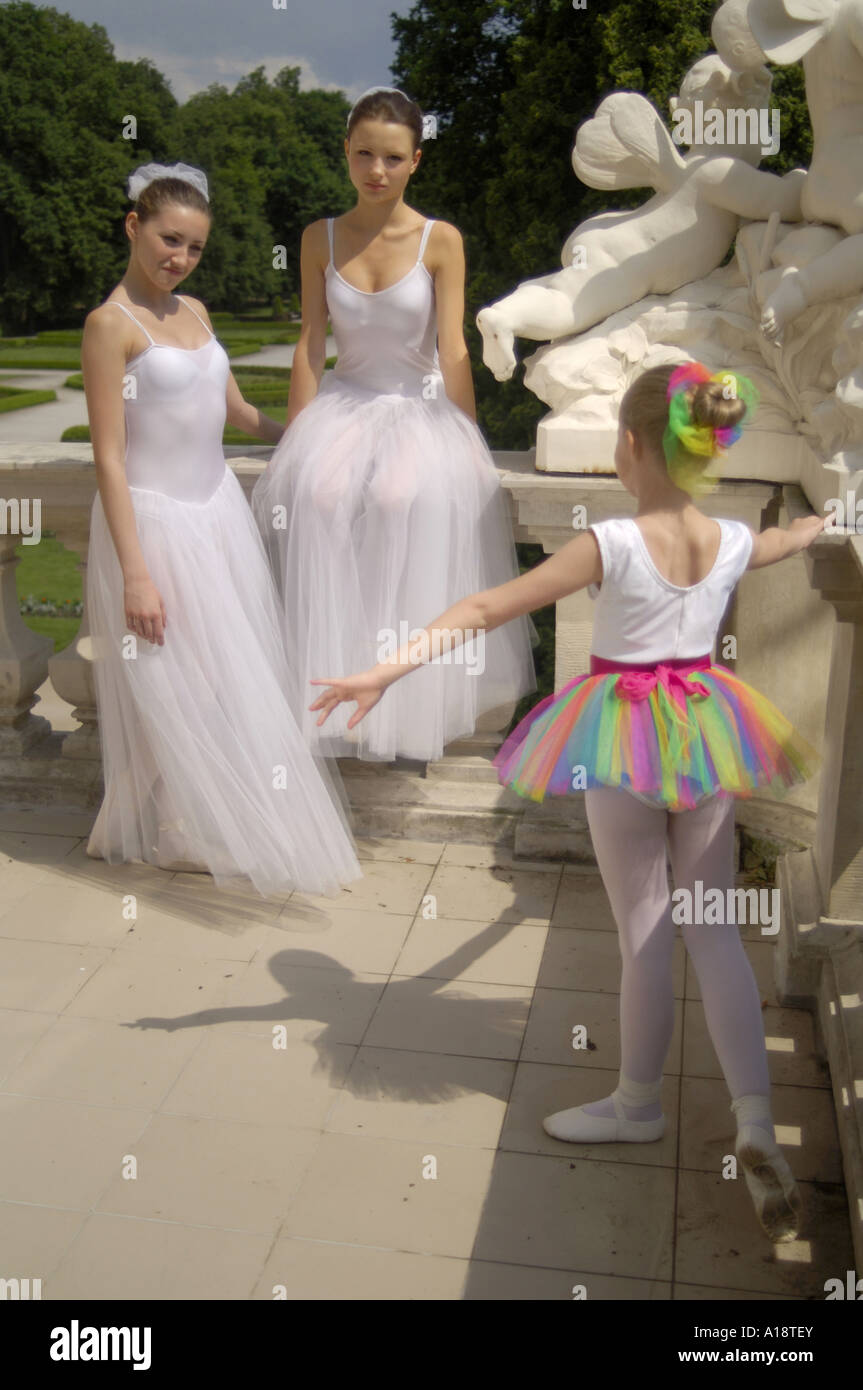 Three Polish ballet dancers posing outside on a balcony Stock Photo - Alamy