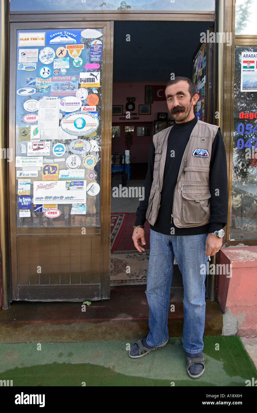 Turkish owner of hostel and cafe by Ishak Pasha Palace Stock Photo - Alamy