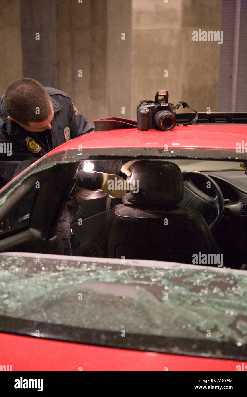 Crime Scene Technician collecting evidence at the scene of a shooting ...