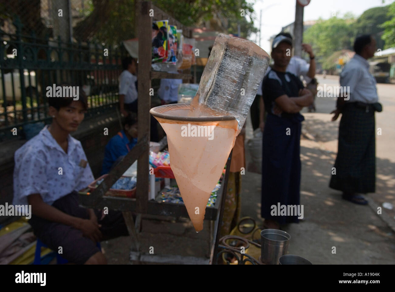 Man selling ice cold water Yangon Myanmar 2006 Stock Photo - Alamy