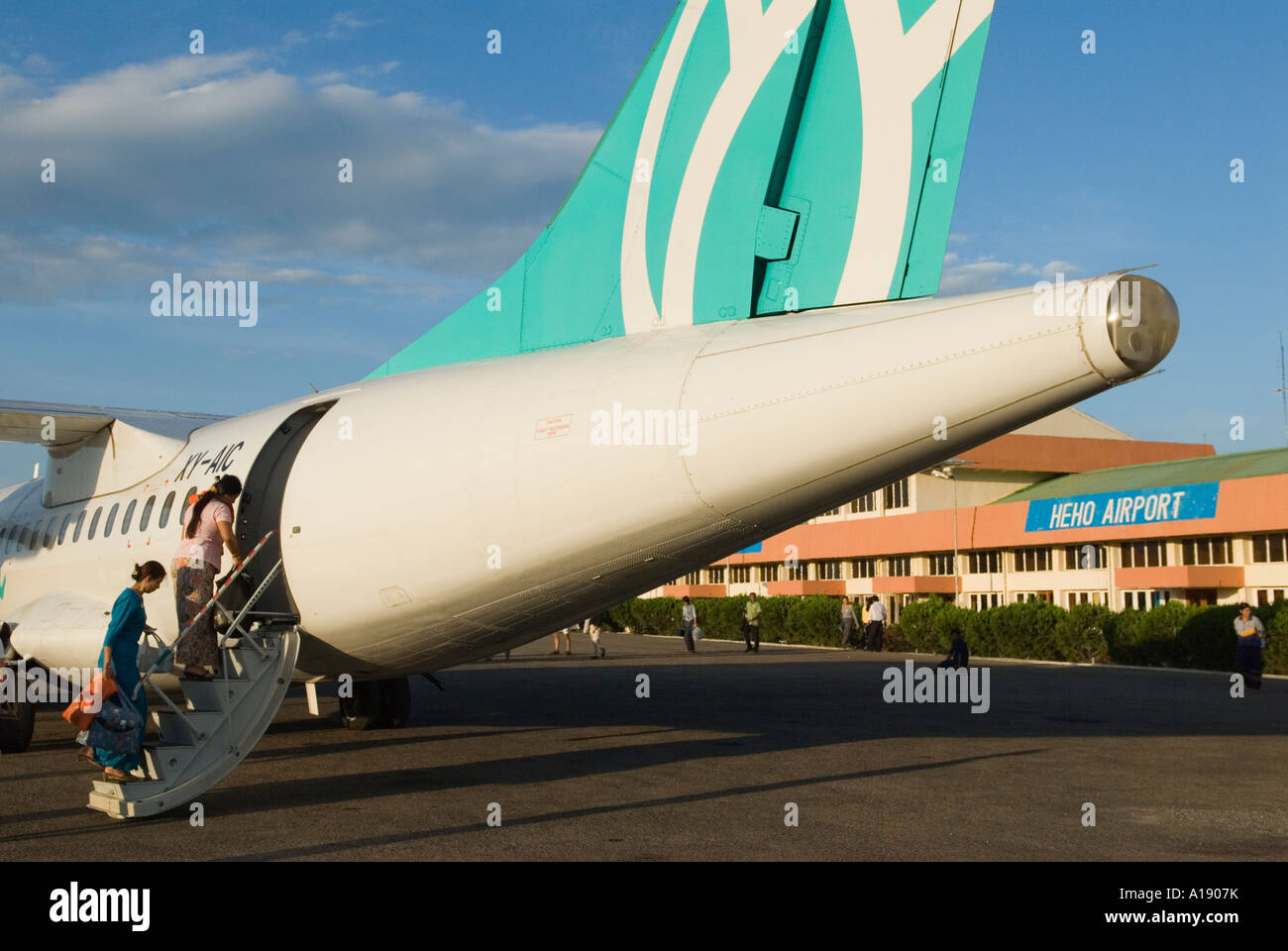 Heho domestic airport Passengers embark on an Air Bagan airplane flight ...