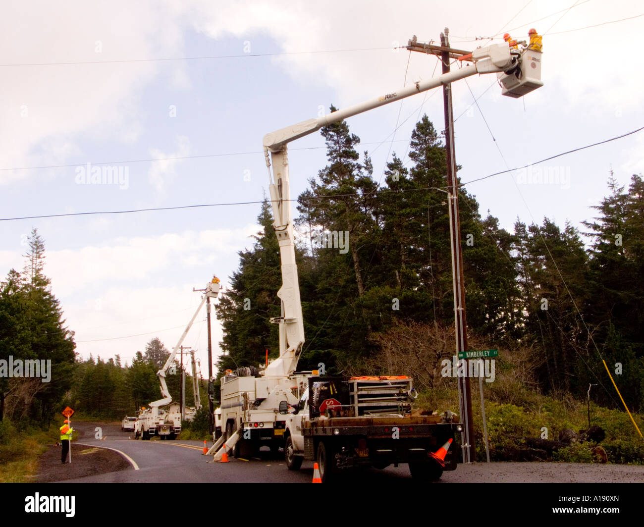 Workers repairing a power pole hi-res stock photography and images - Alamy