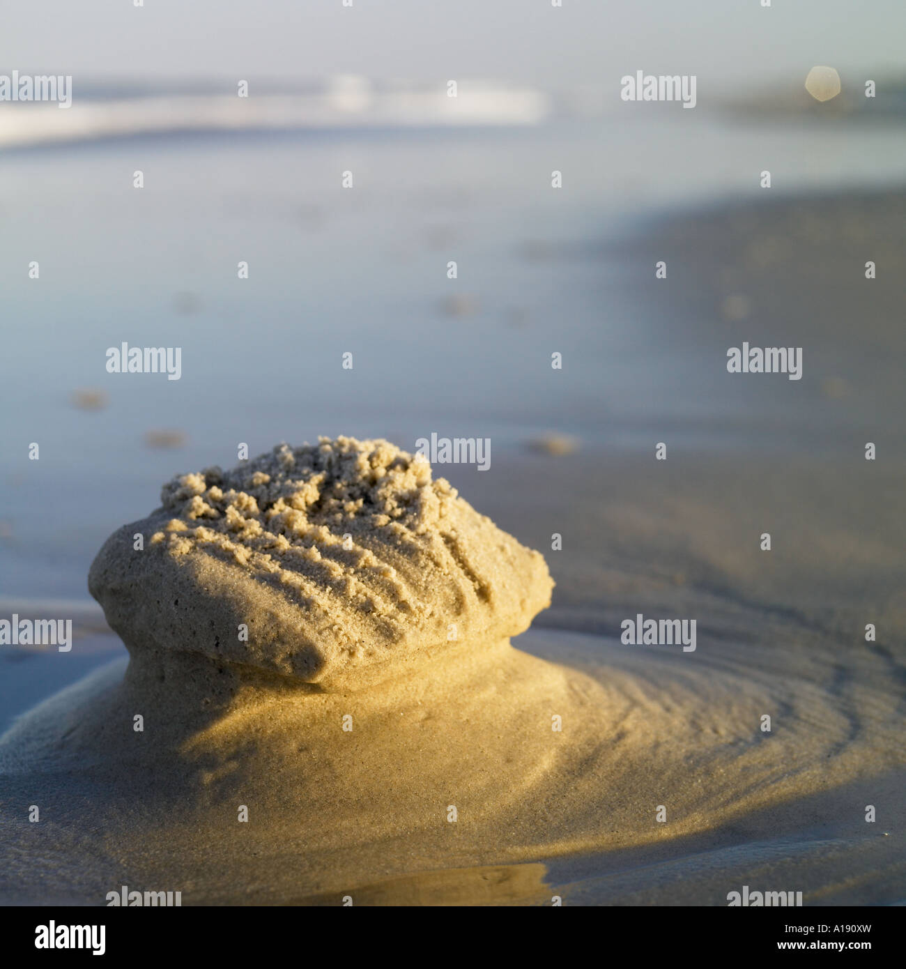 Washed away sand castle hi-res stock photography and images - Alamy