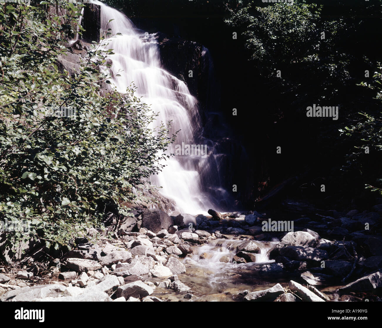 Beautiful waterfall cascades down rocky hi-res stock photography and ...