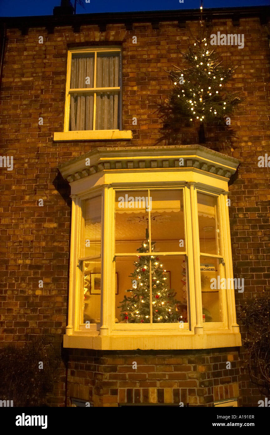 Christmas Tree in Terrace House Window Stock Photo - Alamy