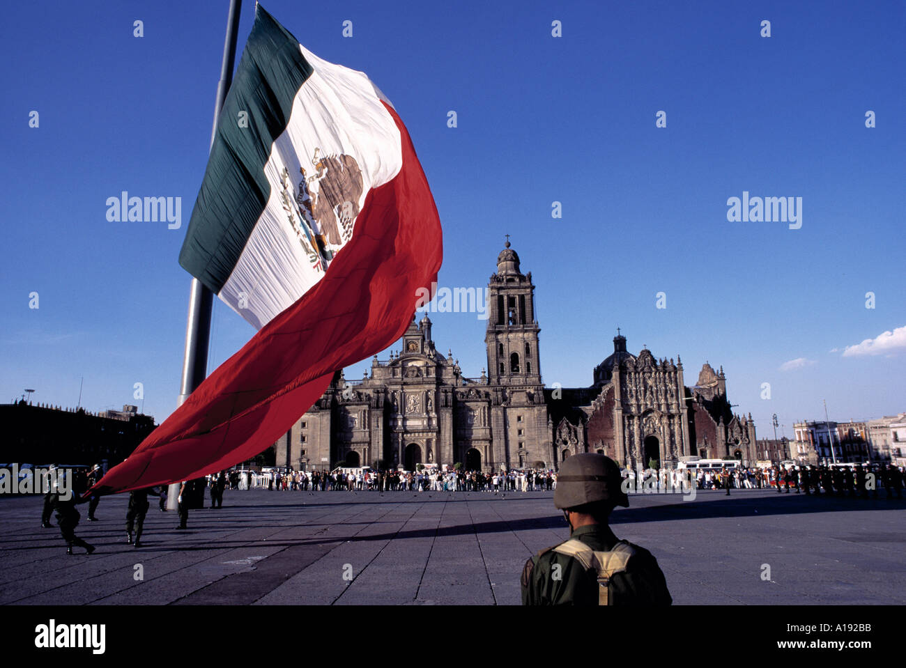 Lowering of National Flag with Cathedral The Zocalo Mexico City Mexico ...