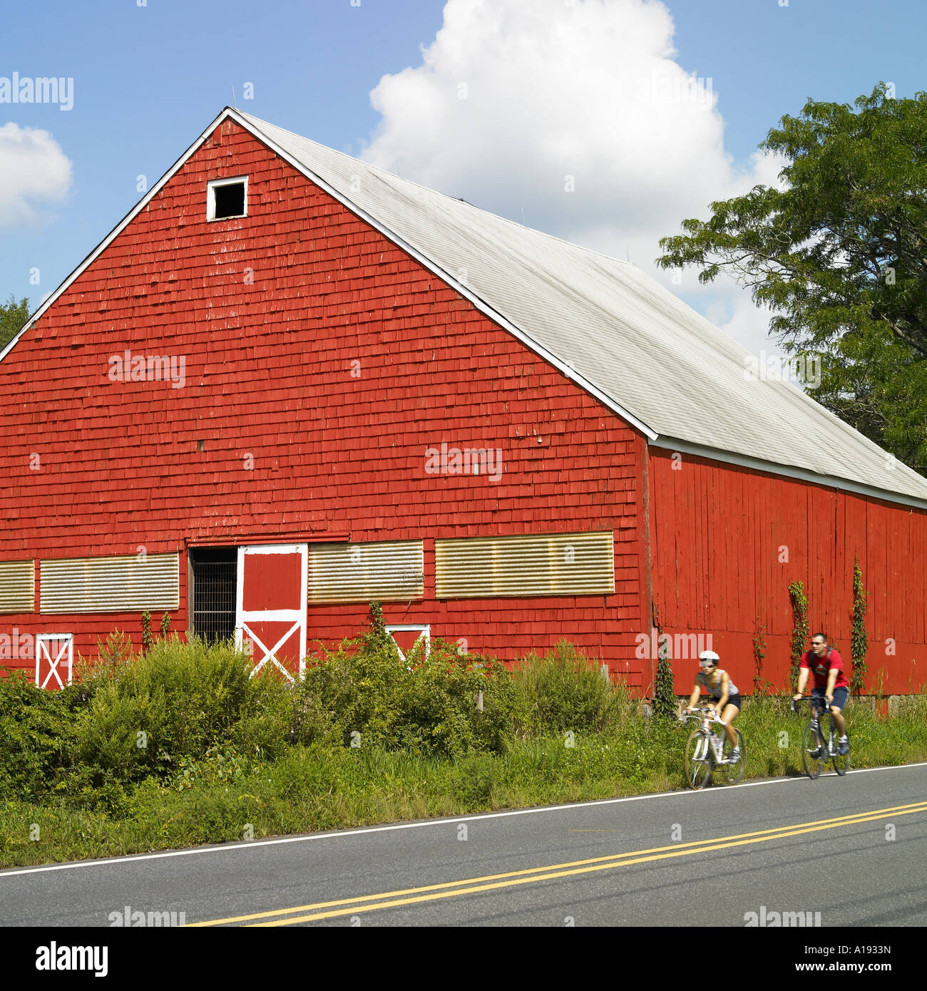 Red barn on summer day Stock Photo - Alamy
