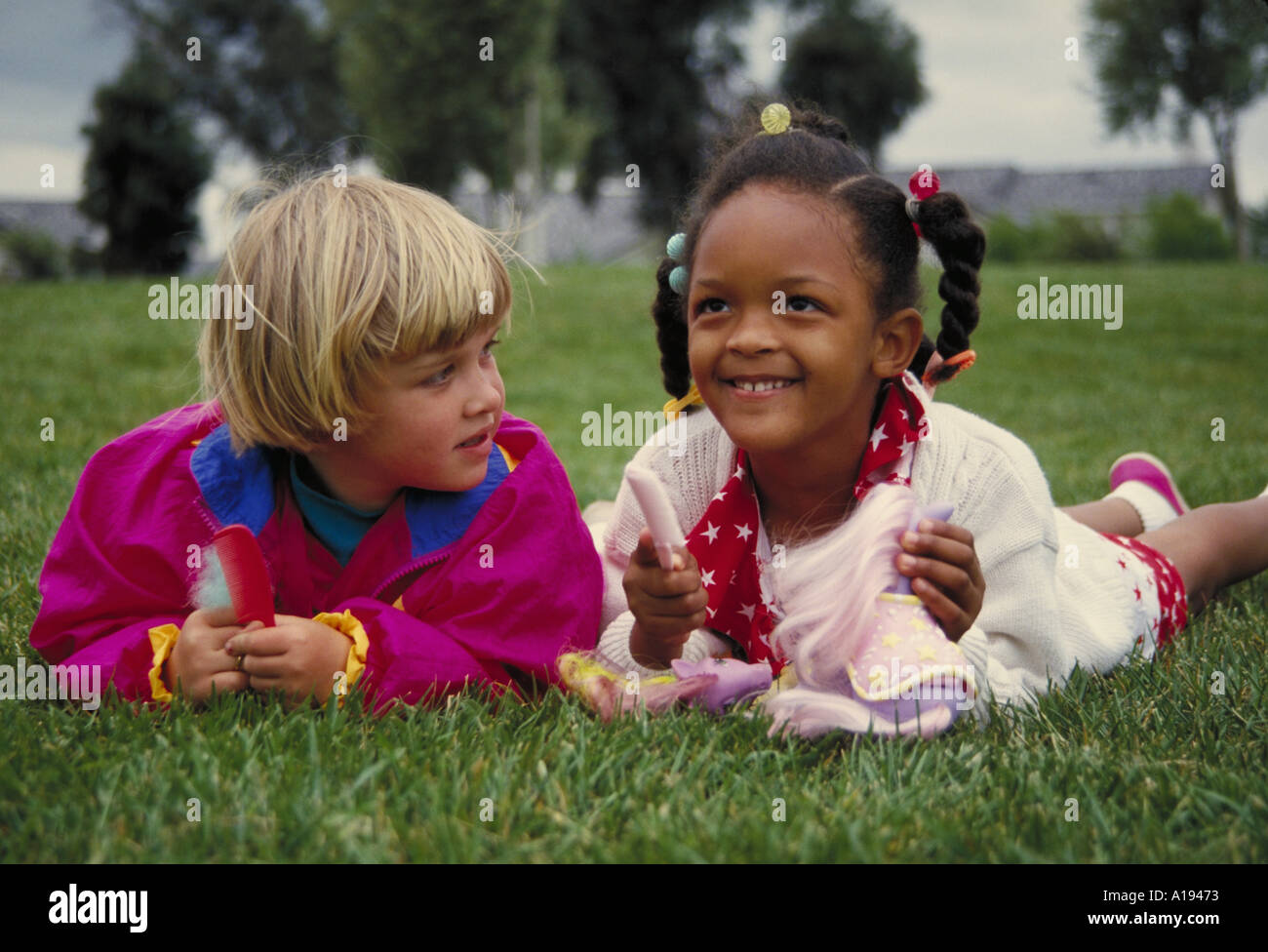 Mixed races children playing hi-res stock photography and images - Alamy