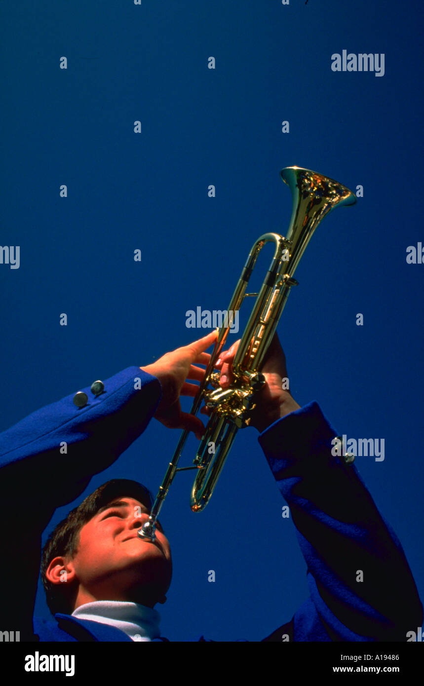 Boy playing trumpet Stock Photo - Alamy