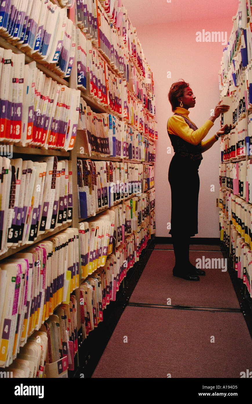 Office assistant filing hi-res stock photography and images - Alamy