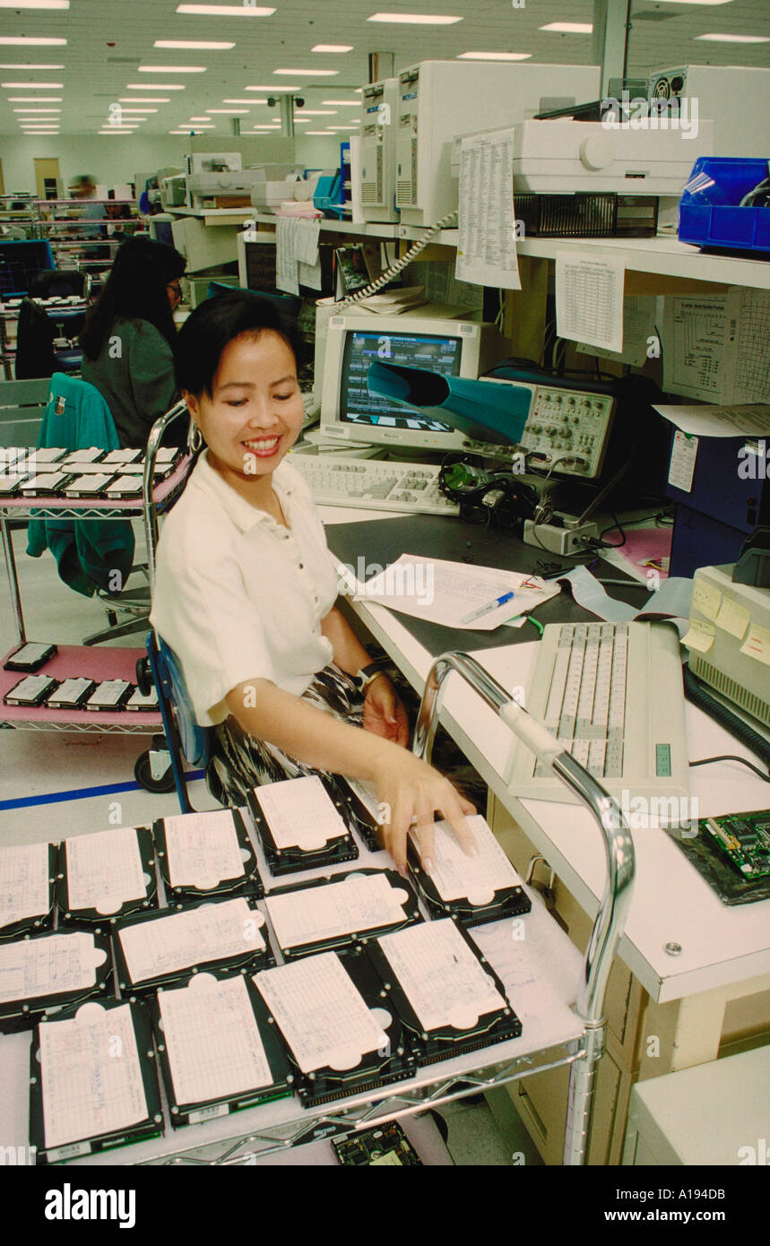 Cambodian female testing computer hard disk drives CA Stock Photo - Alamy