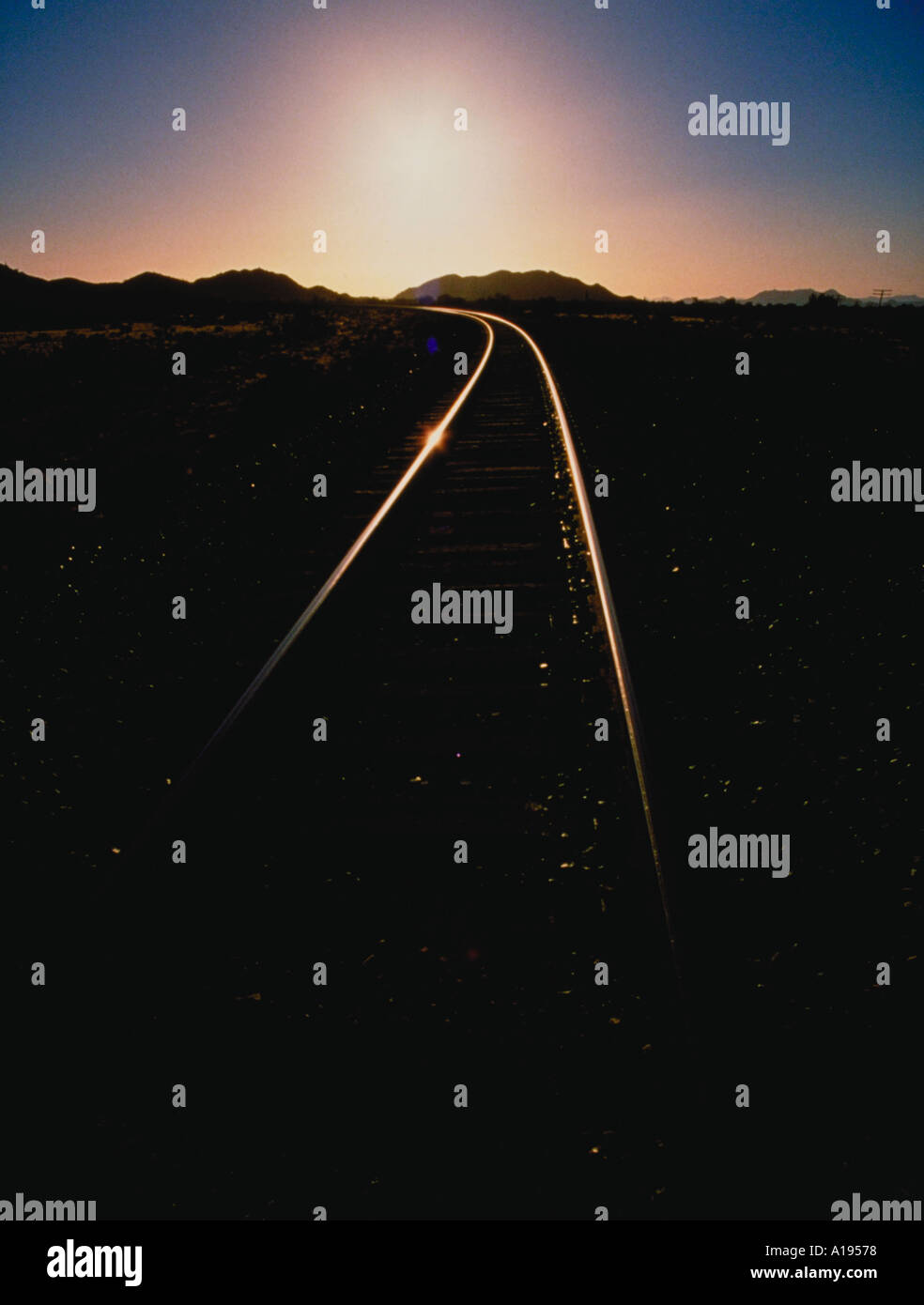 Sunrise over train tracks hi-res stock photography and images - Alamy