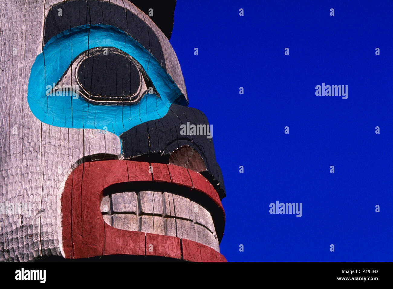 Face of native totem pole Alaska Stock Photo - Alamy