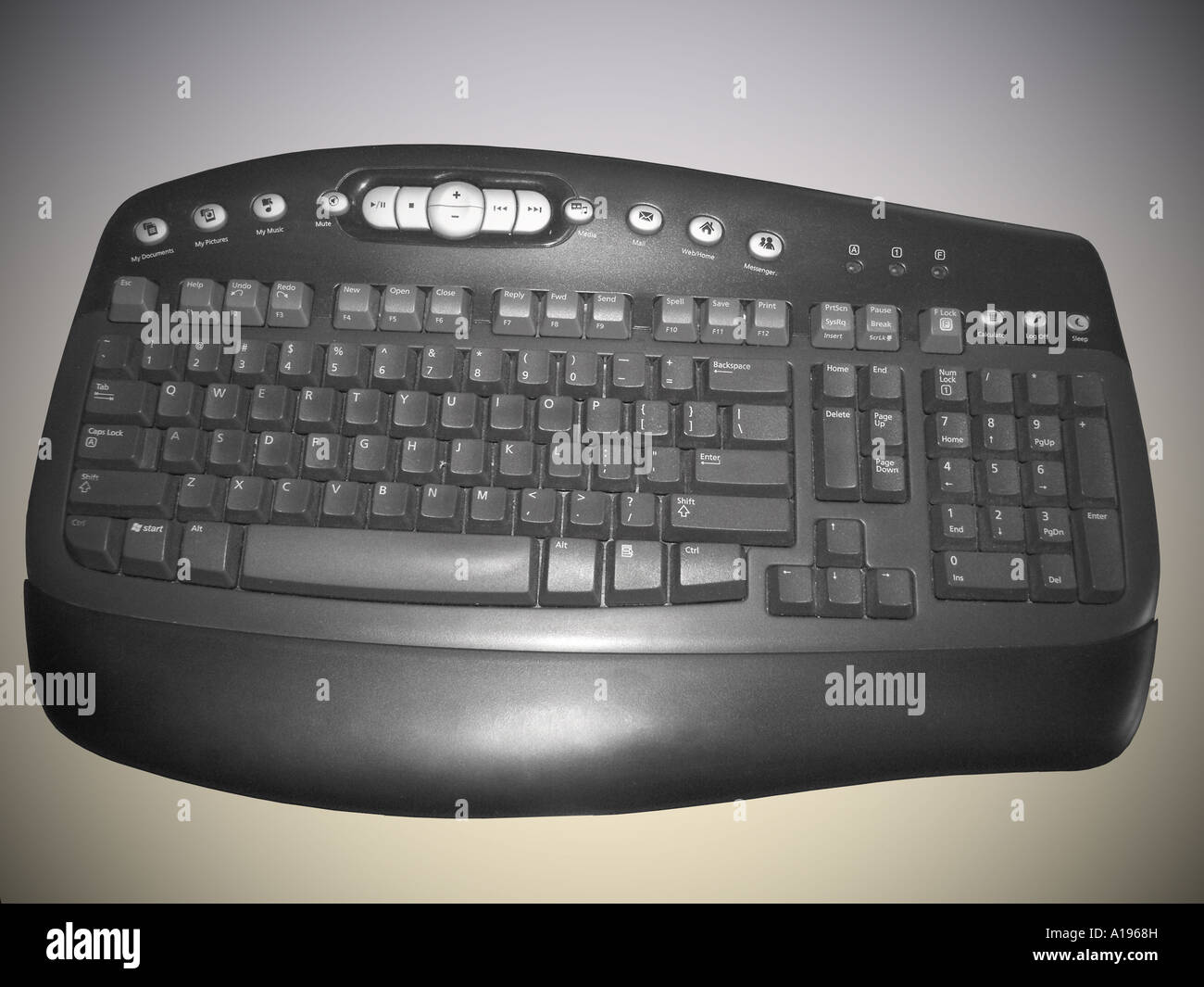 Black / grey computer keyboard on light grey background Stock Photo - Alamy