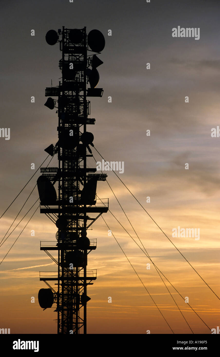 Communications tower at sunset Stock Photo - Alamy