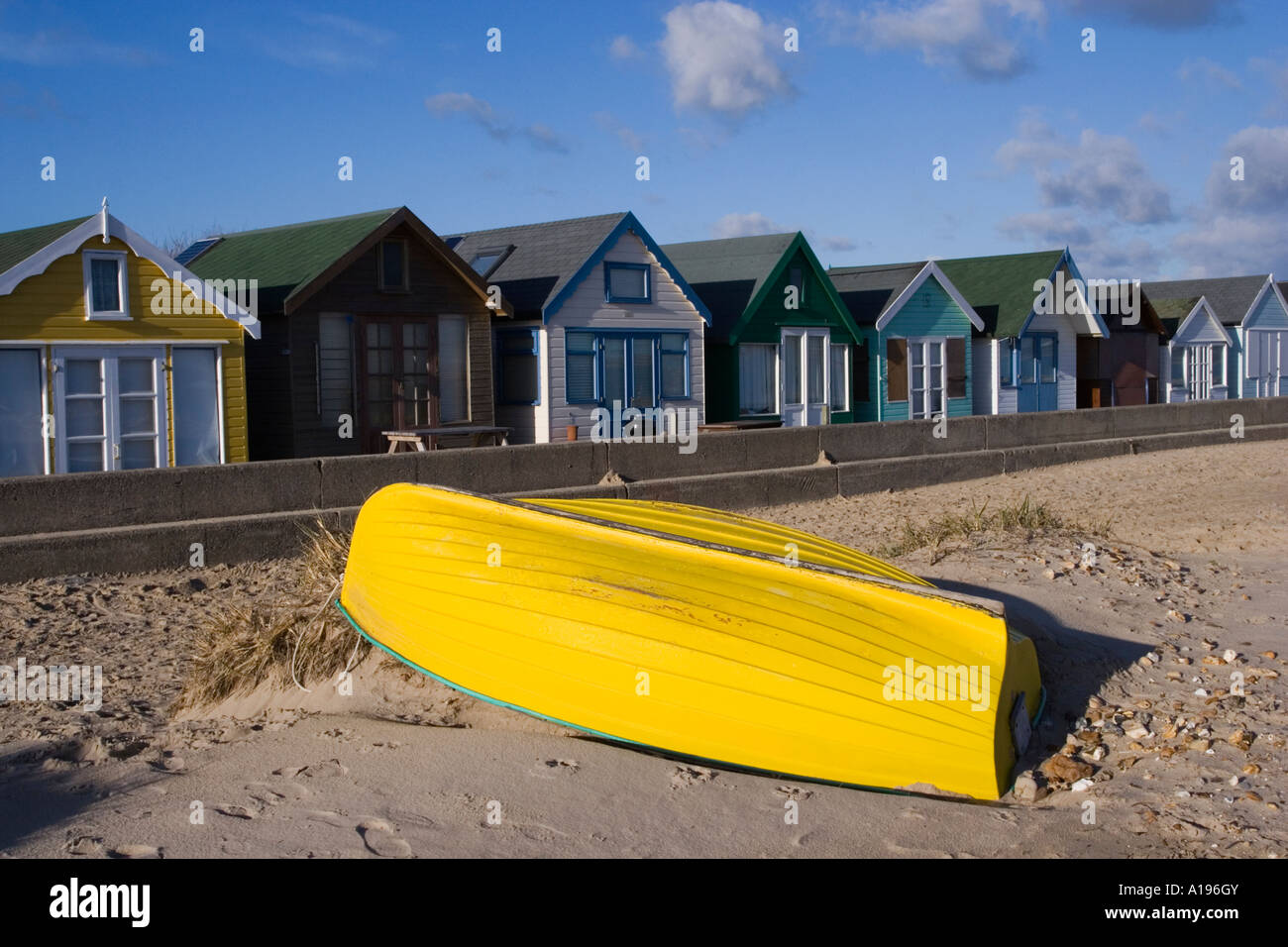 Beach Huts and upturned boat at Mudeford Spit, Christchurch Harbour ...