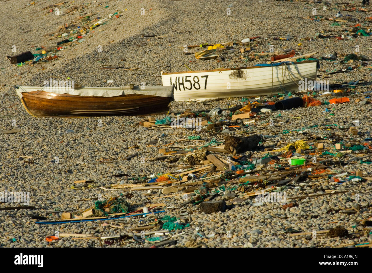 Flotsam and Jetsam Washed Ashore with boats, Chesil Beach, Portland ...