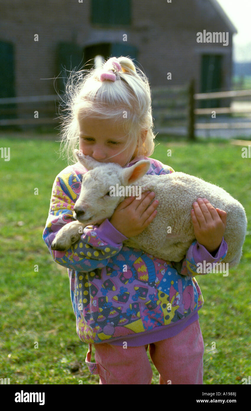 Child with a lamb hi-res stock photography and images - Alamy