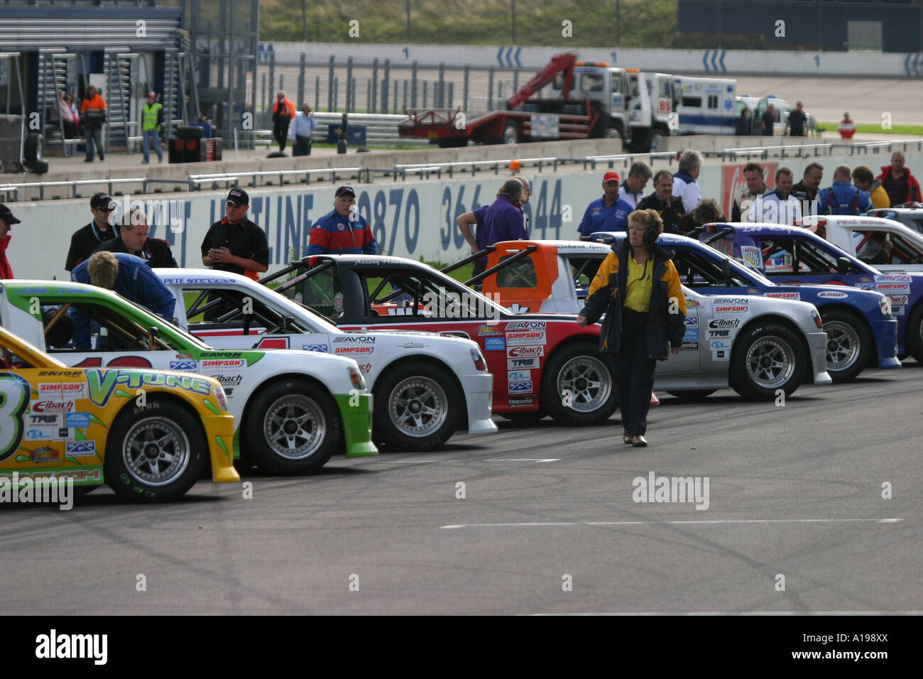 Racing pick up trucks lined up before the start of a race Stock Photo ...