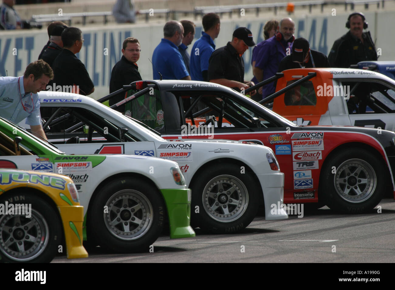 Racing pick up trucks lined up before the start of a race Stock Photo ...