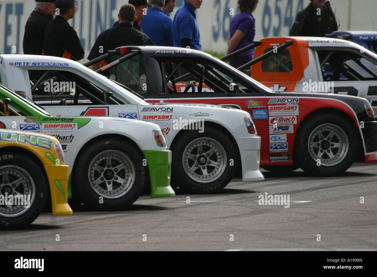 Racing pick up trucks lined up before the start of a race Stock Photo ...