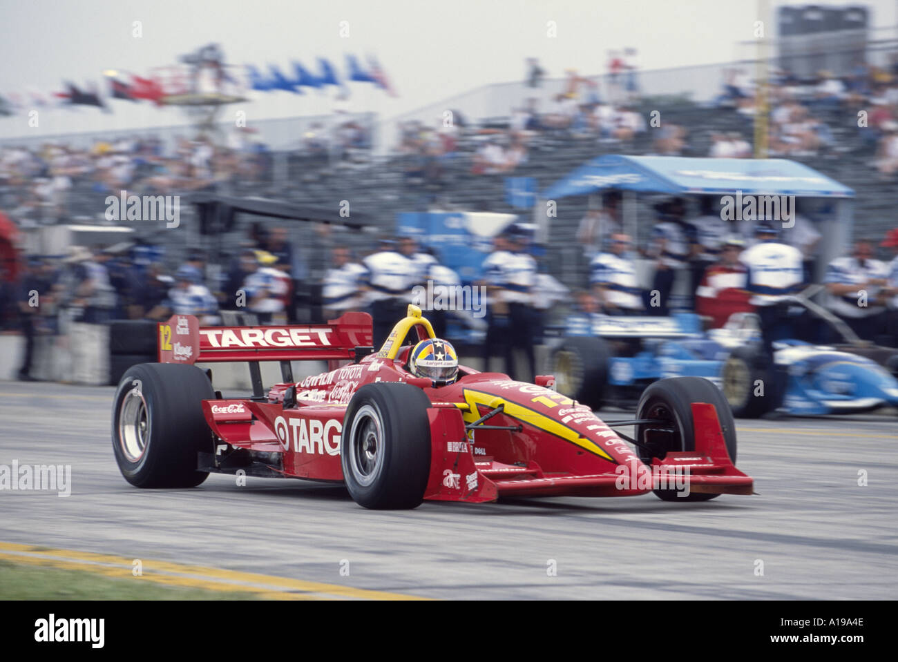 Memo Gidley drives down the pit lane at the 2001 Cleveland CART race ...