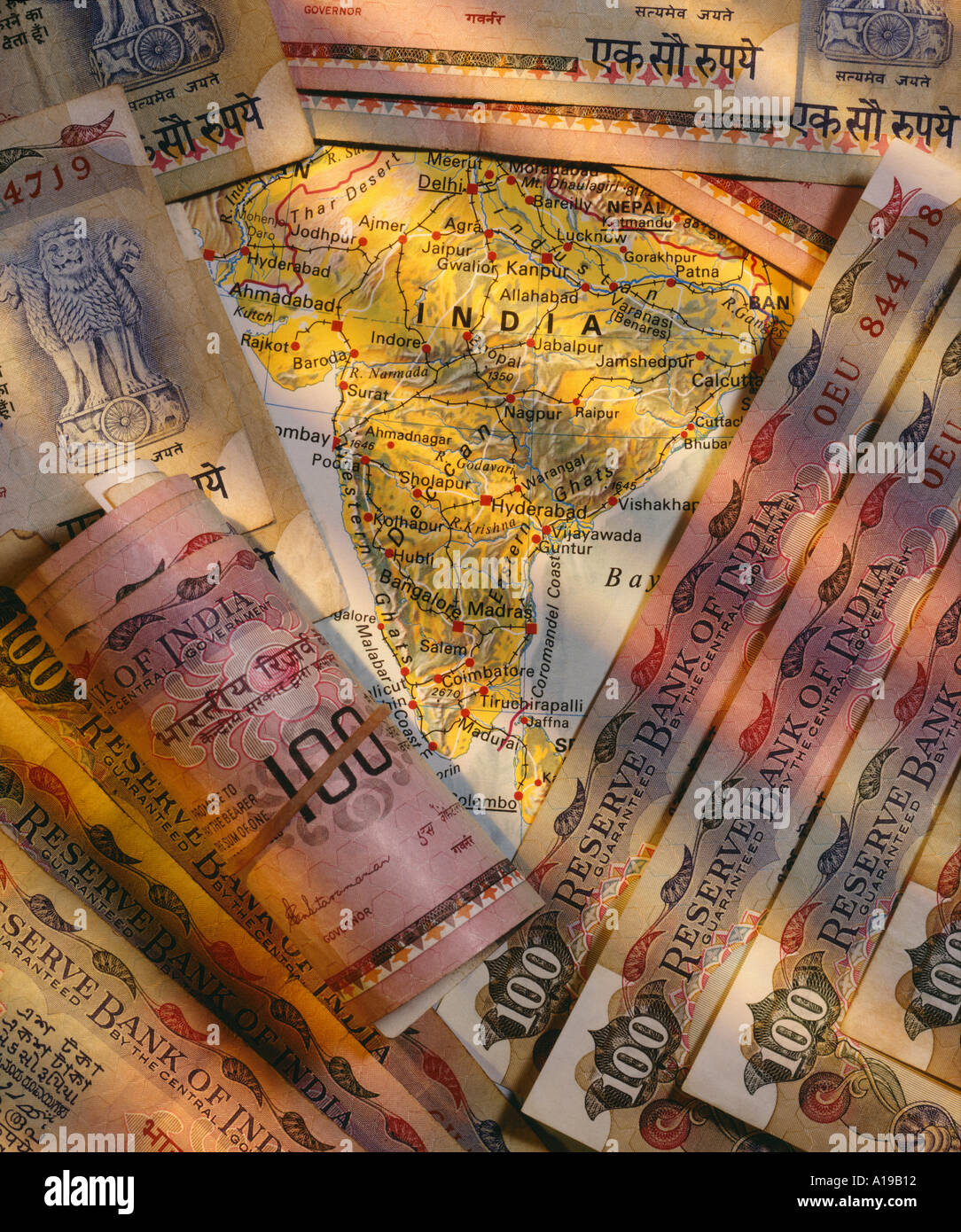 Indian money on map of India Stock Photo - Alamy