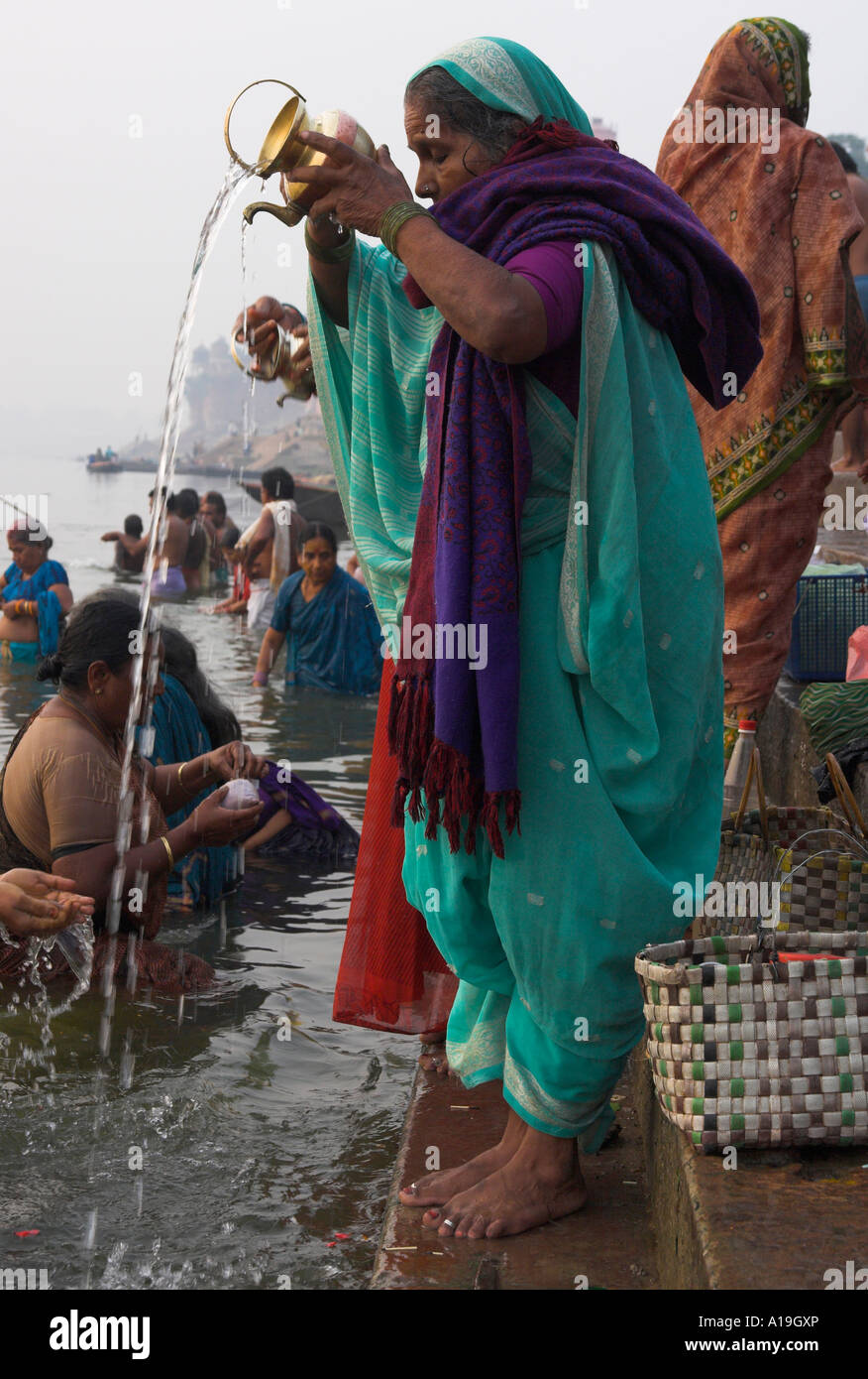 India Uttar Pradesh Ganges valley Varanassi Kedar ghat at sunrise woman ...