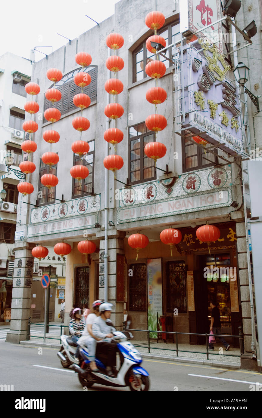 Macau People Driving Scooters Along Avenida Almeida Ribeiro Macau's ...
