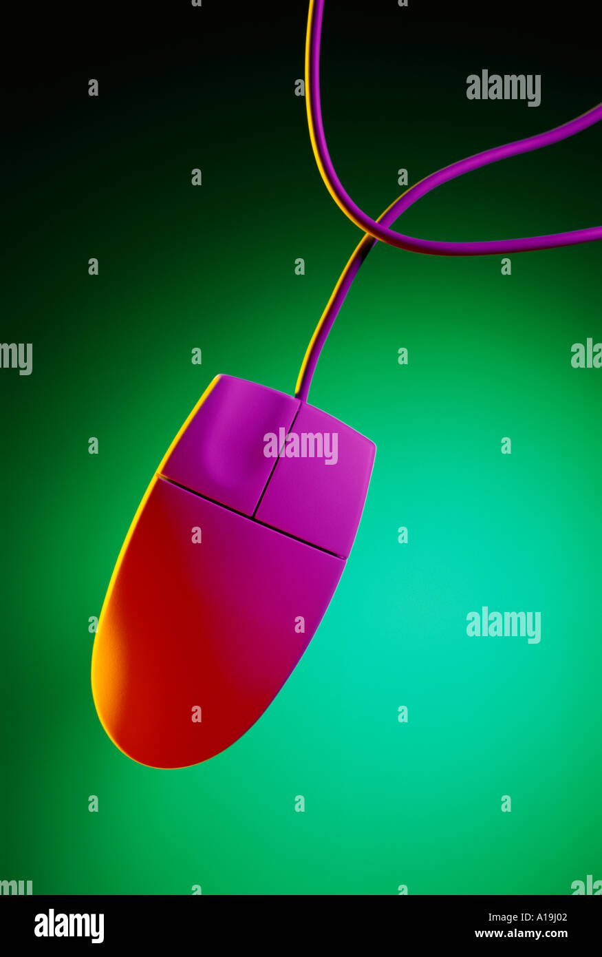 Computer mouse with coloured lights on colour background Stock Photo ...