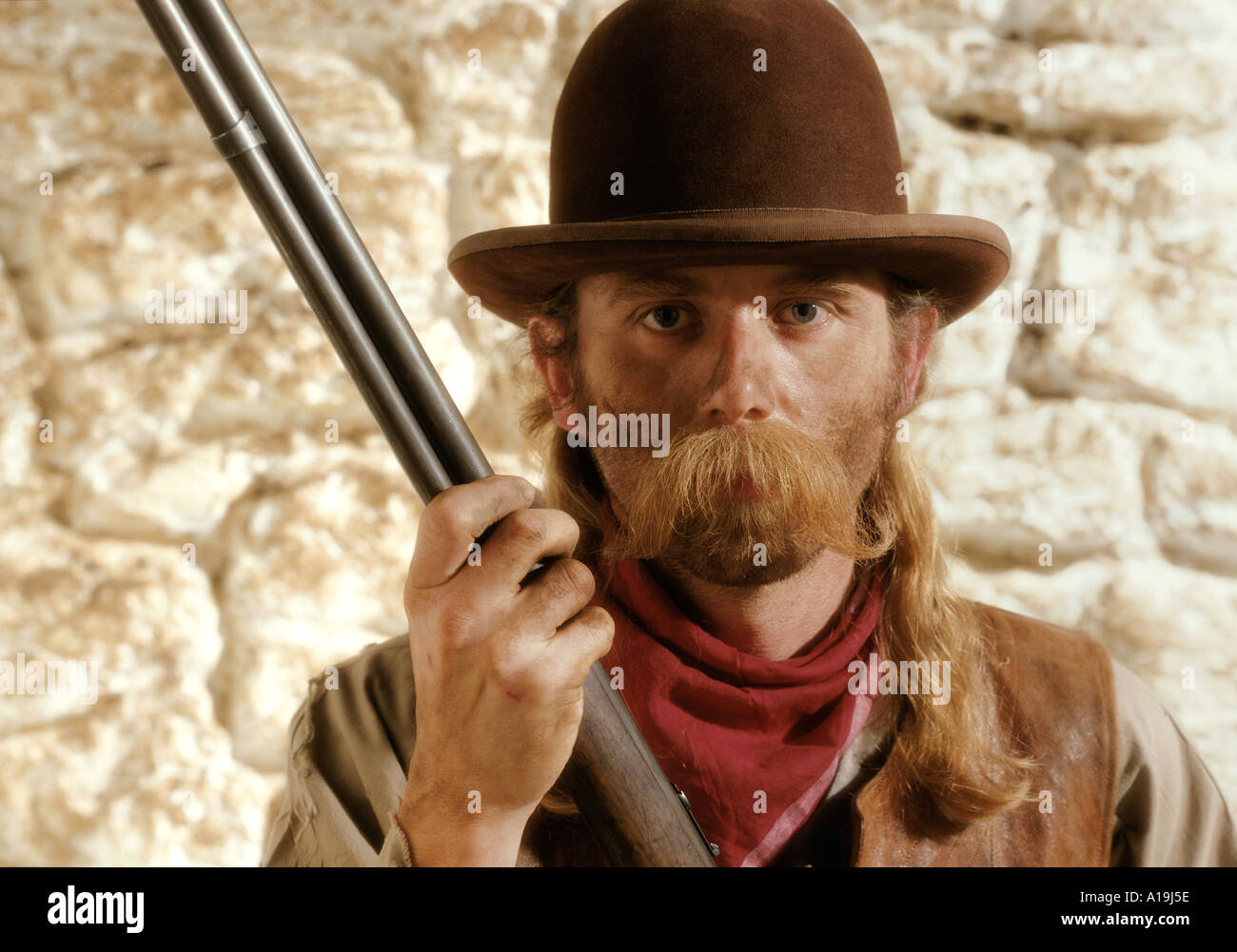 Cowboy with rifle hi-res stock photography and images - Alamy