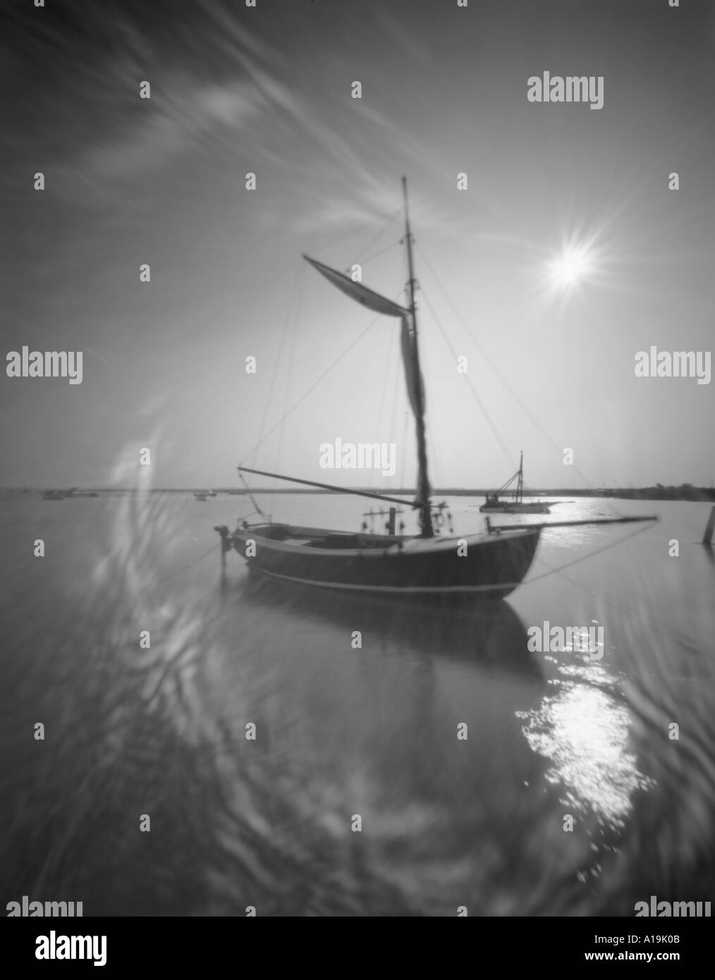 Moored boat on a river boat Black and White Stock Photos & Images - Alamy