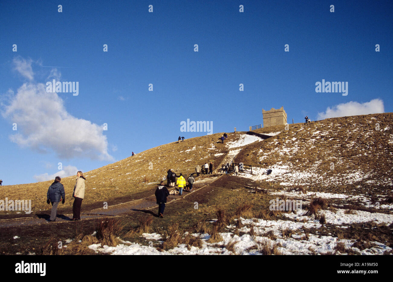 Walking up snow covered moor to Rivington Pike in Lever Park Lancashire ...