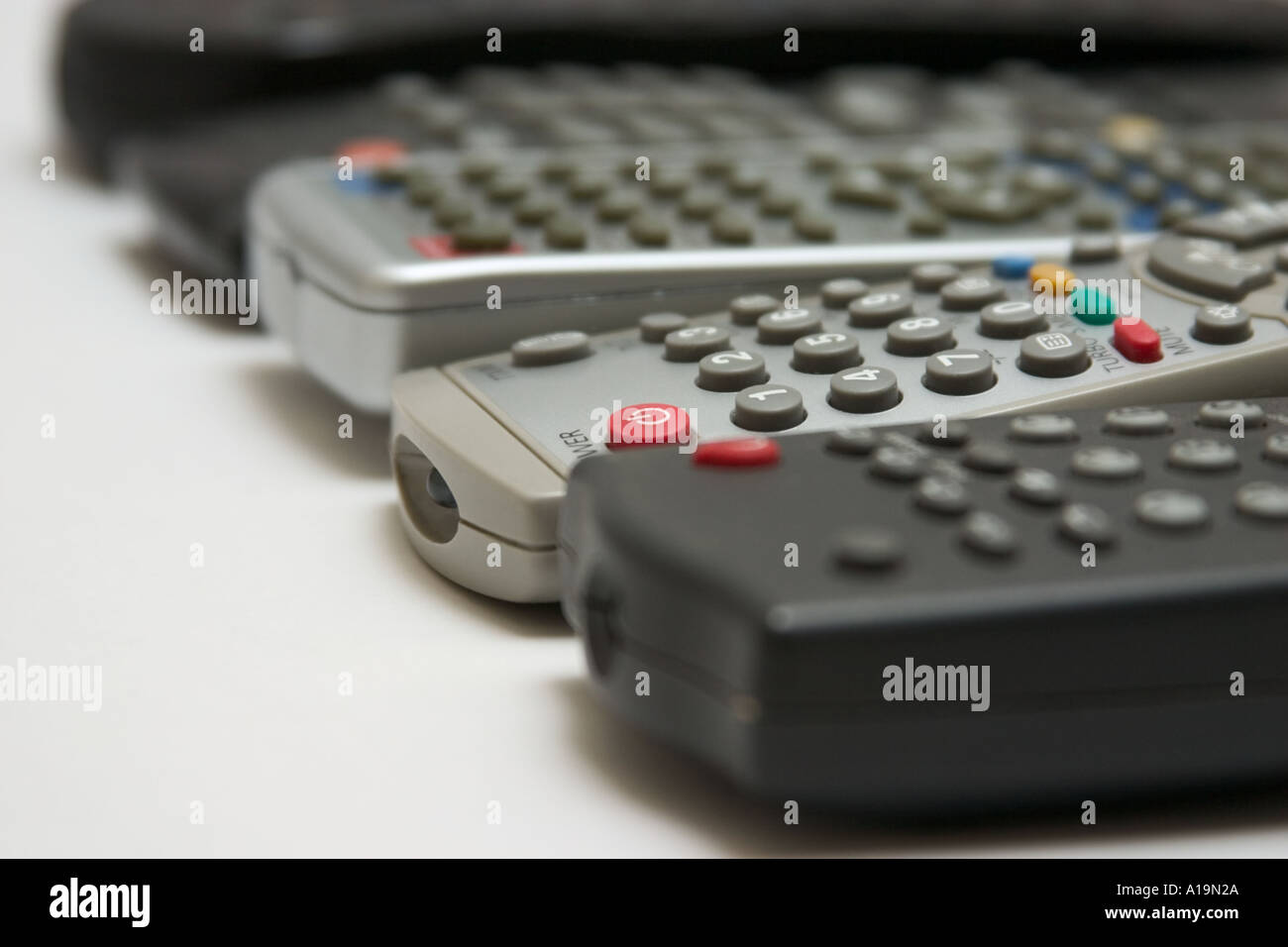 many remote controls for different appliances concept confusion Stock ...