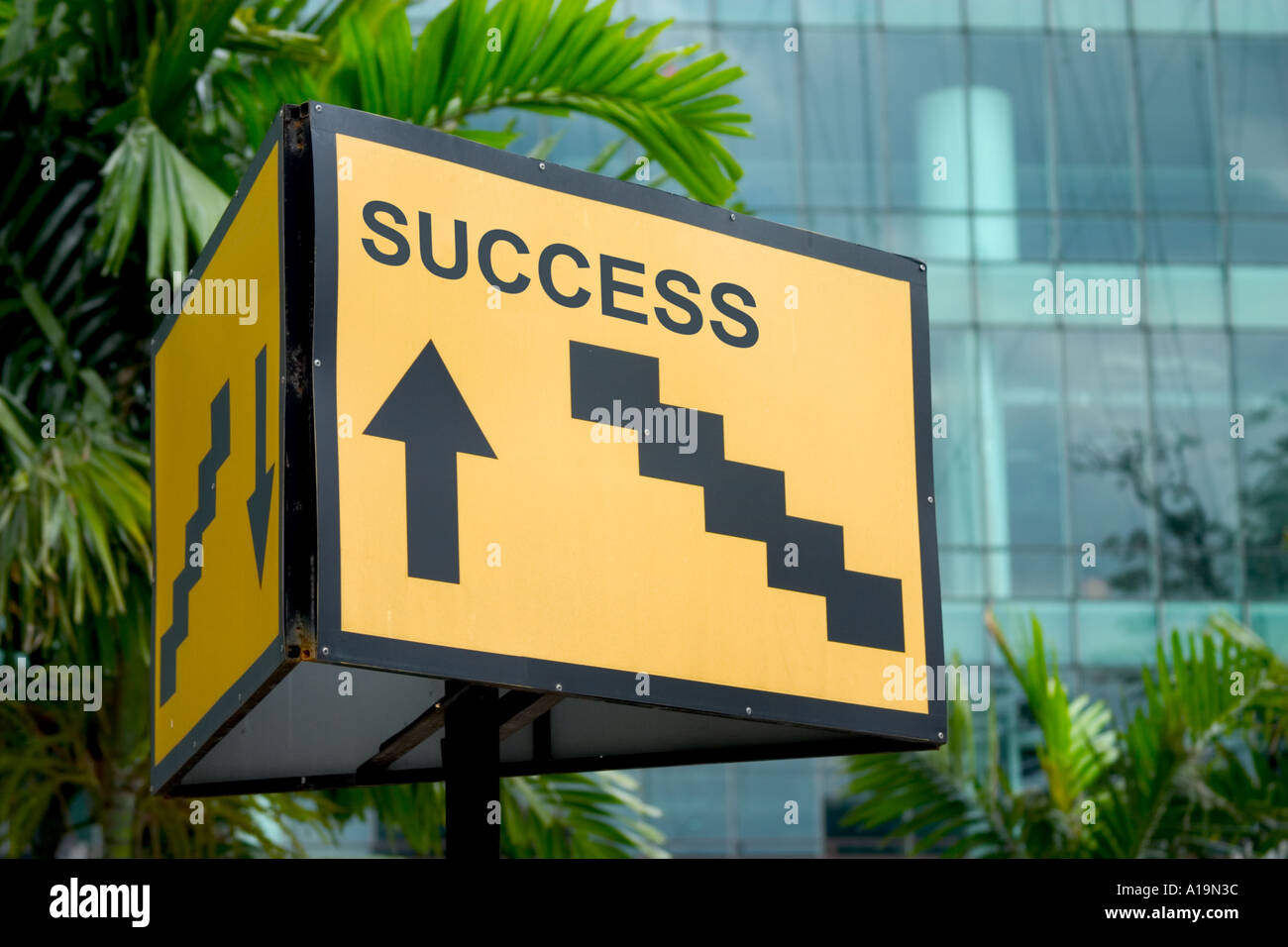 signboard showing arrow and stairs to success Stock Photo - Alamy