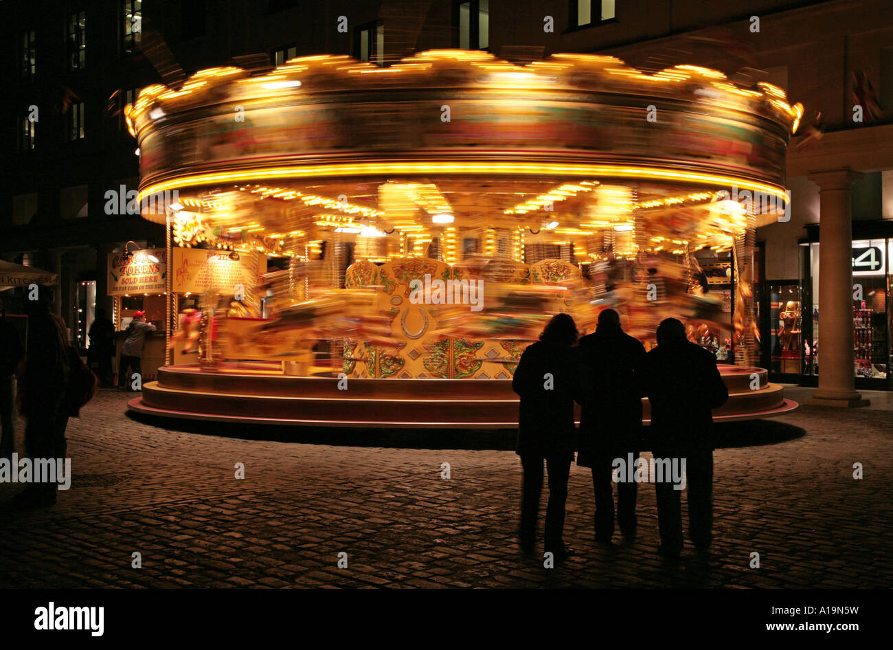 Merry go round night uk hi-res stock photography and images - Alamy