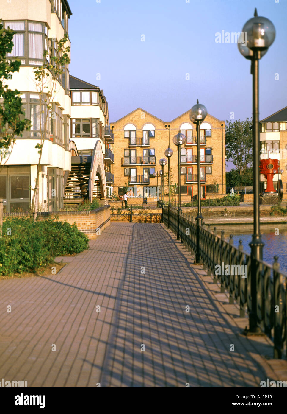 Docklands waterside housing developments and walkways Stock Photo - Alamy