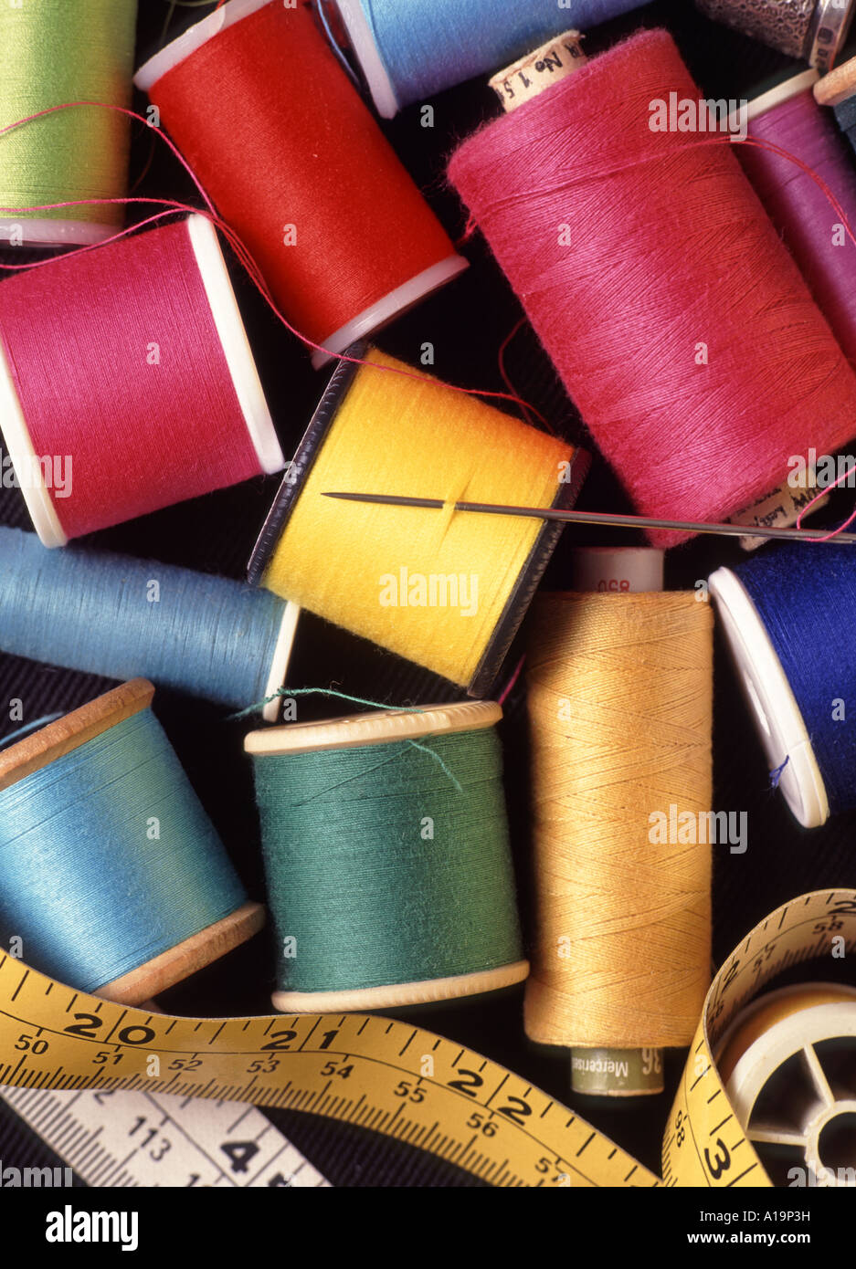 Close up still life selection of assorted coloured needlecraft & sewing ...