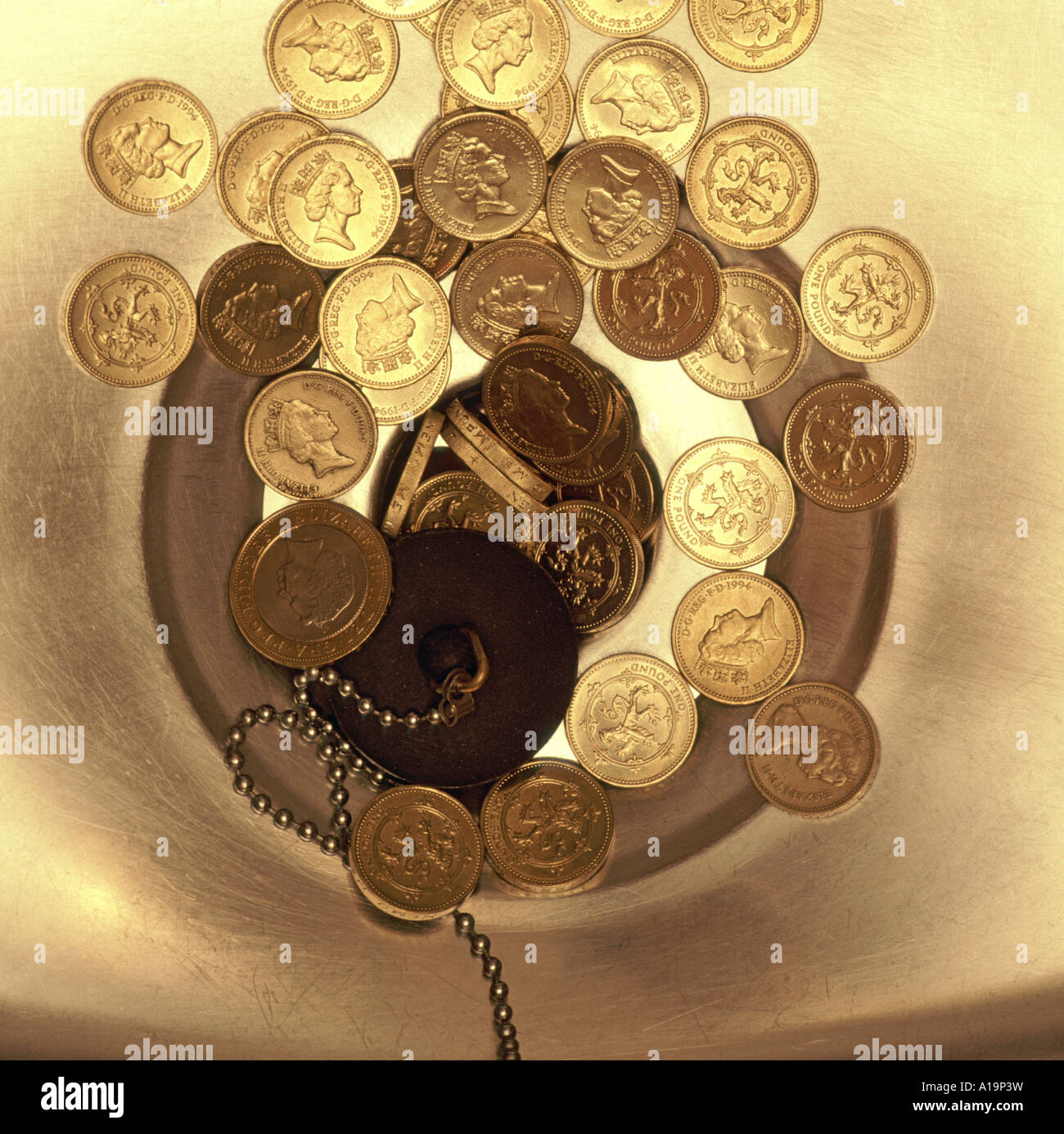 Money down the drain uk hi-res stock photography and images - Alamy